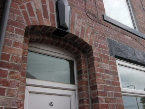 Close up and arch detail » Reclaiming Your Home from Ugly Stone Cladding