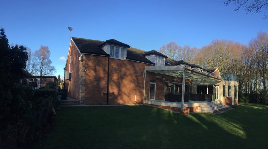 rear corner after brick cladding - Reclaiming Your Home from Ugly Stone ...